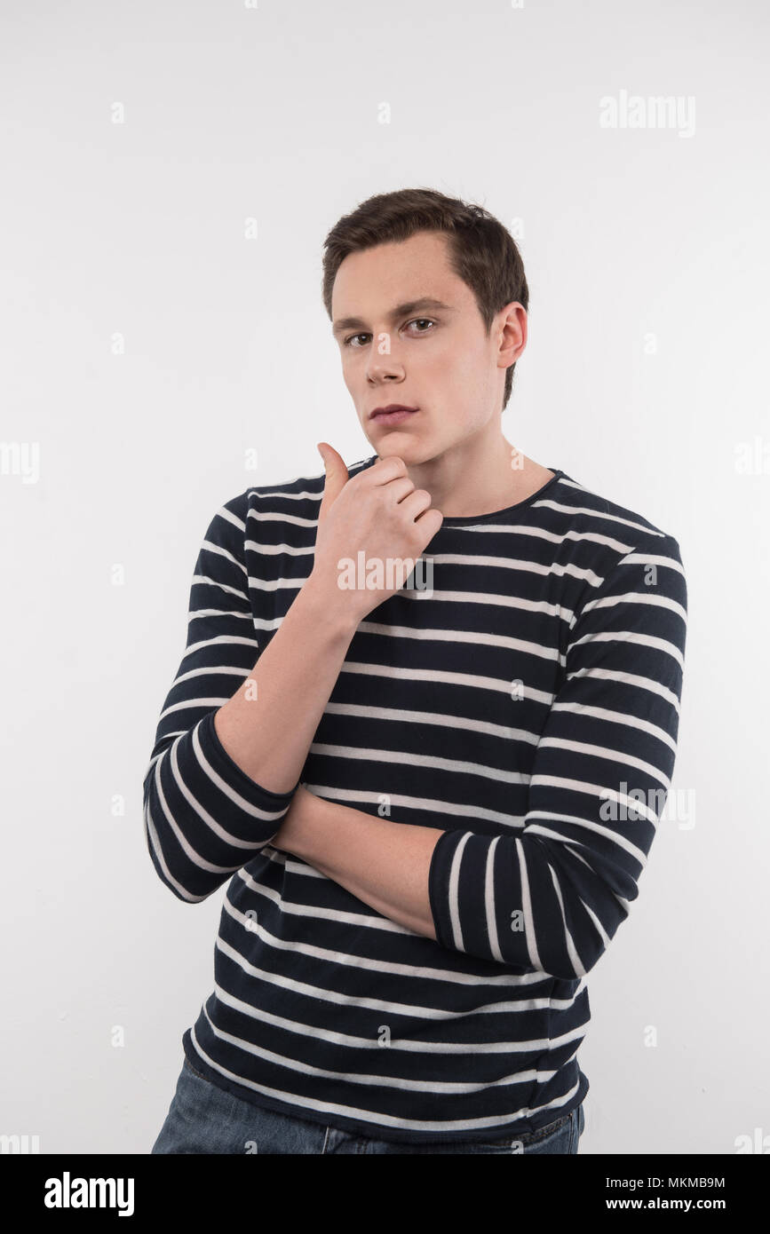 Serious handsome man looking at you Stock Photo - Alamy