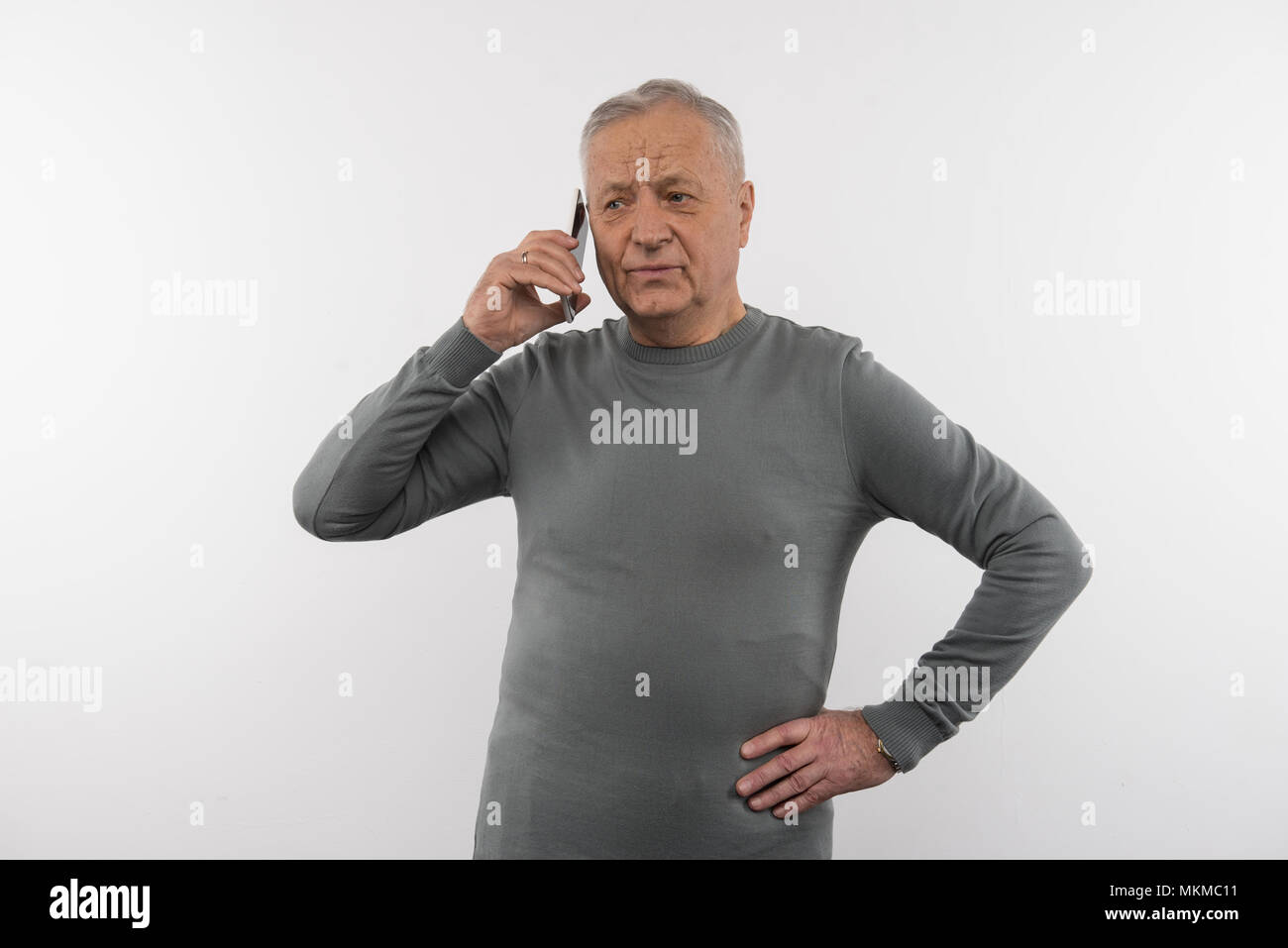Nice aged man making a call Stock Photo - Alamy