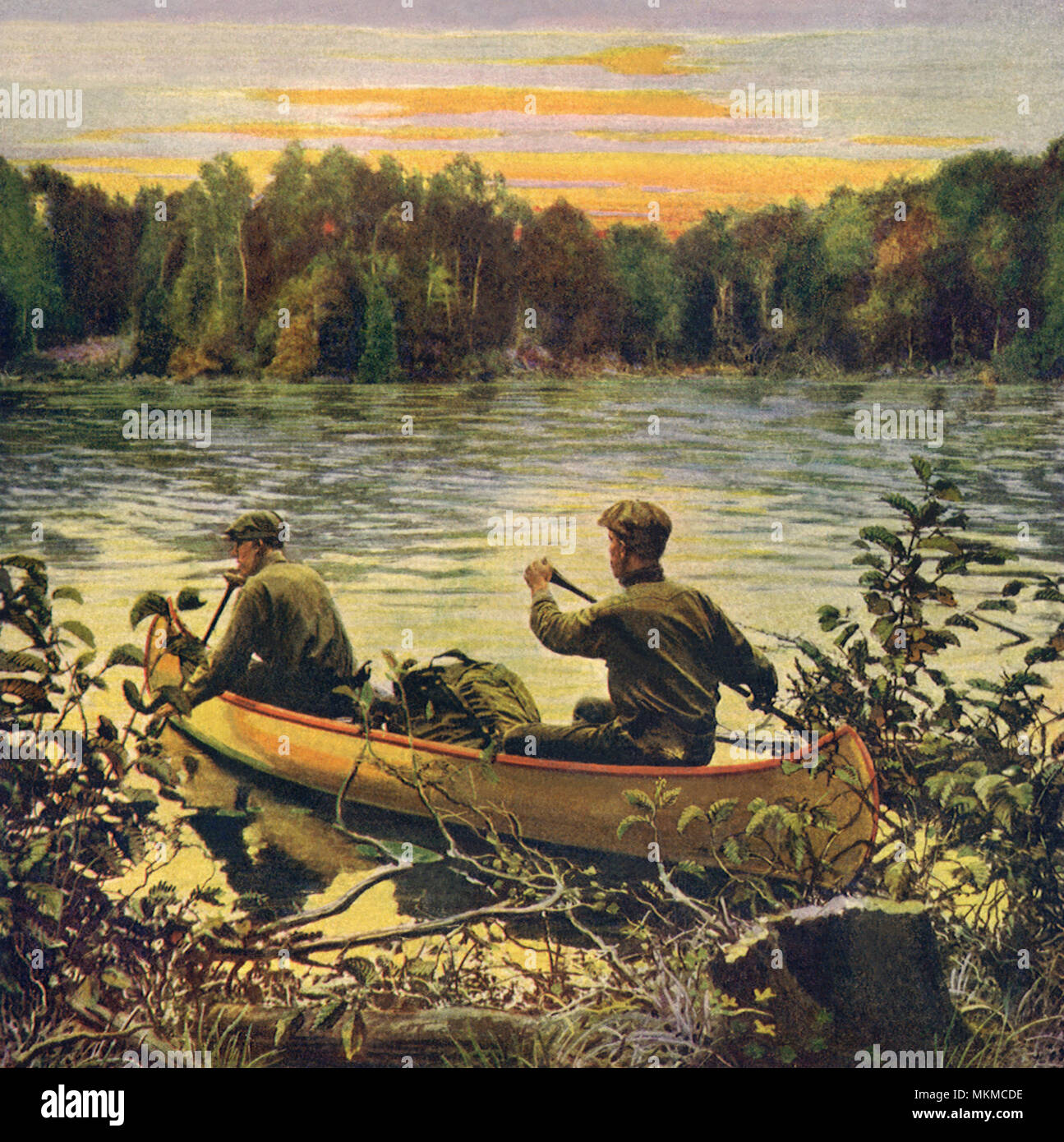 Two Men in Canoe Stock Photo - Alamy