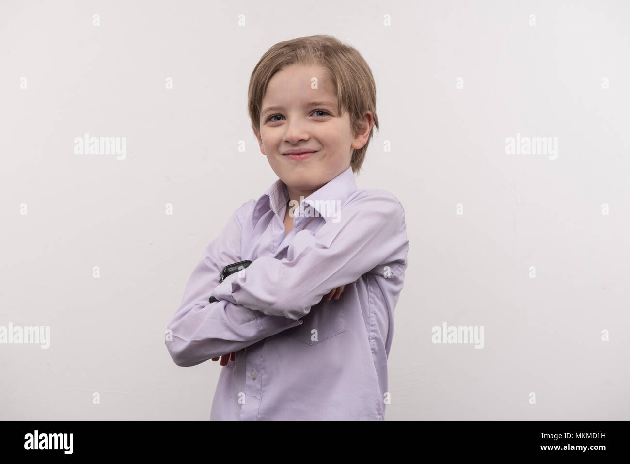 Nice confident boy looking at you Stock Photo - Alamy