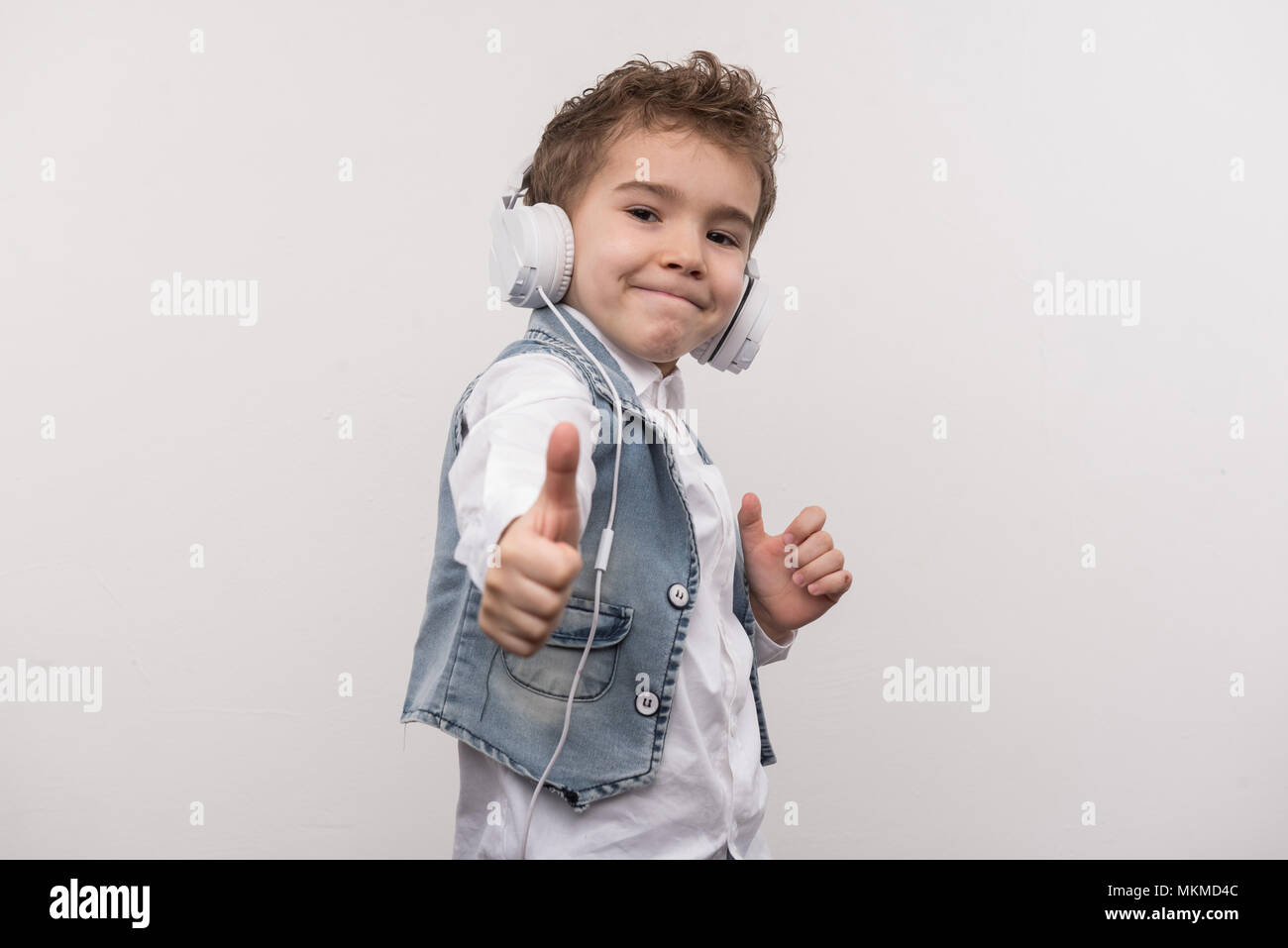 Joyful positive boy showing Ok sign Stock Photo - Alamy