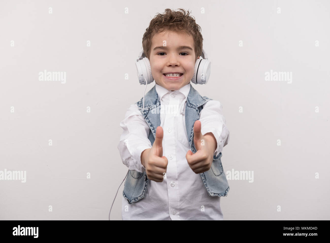 Cheerful cute boy being in a great mood Stock Photo - Alamy