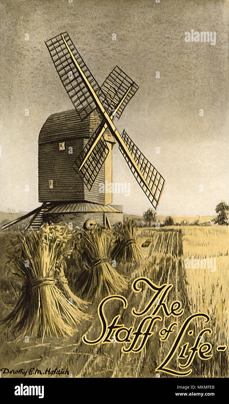 Windmill and Haystacks Stock Photo - Alamy