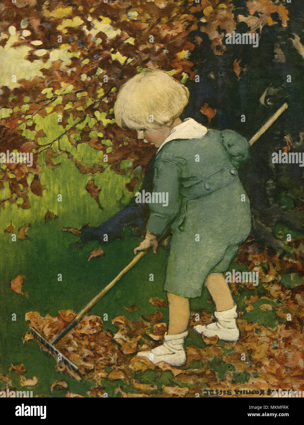 Boy Raking Leaves Stock Photo - Alamy