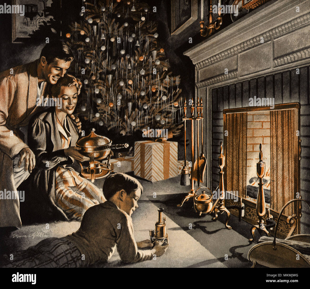 Family by Christmas Fire Stock Photo - Alamy