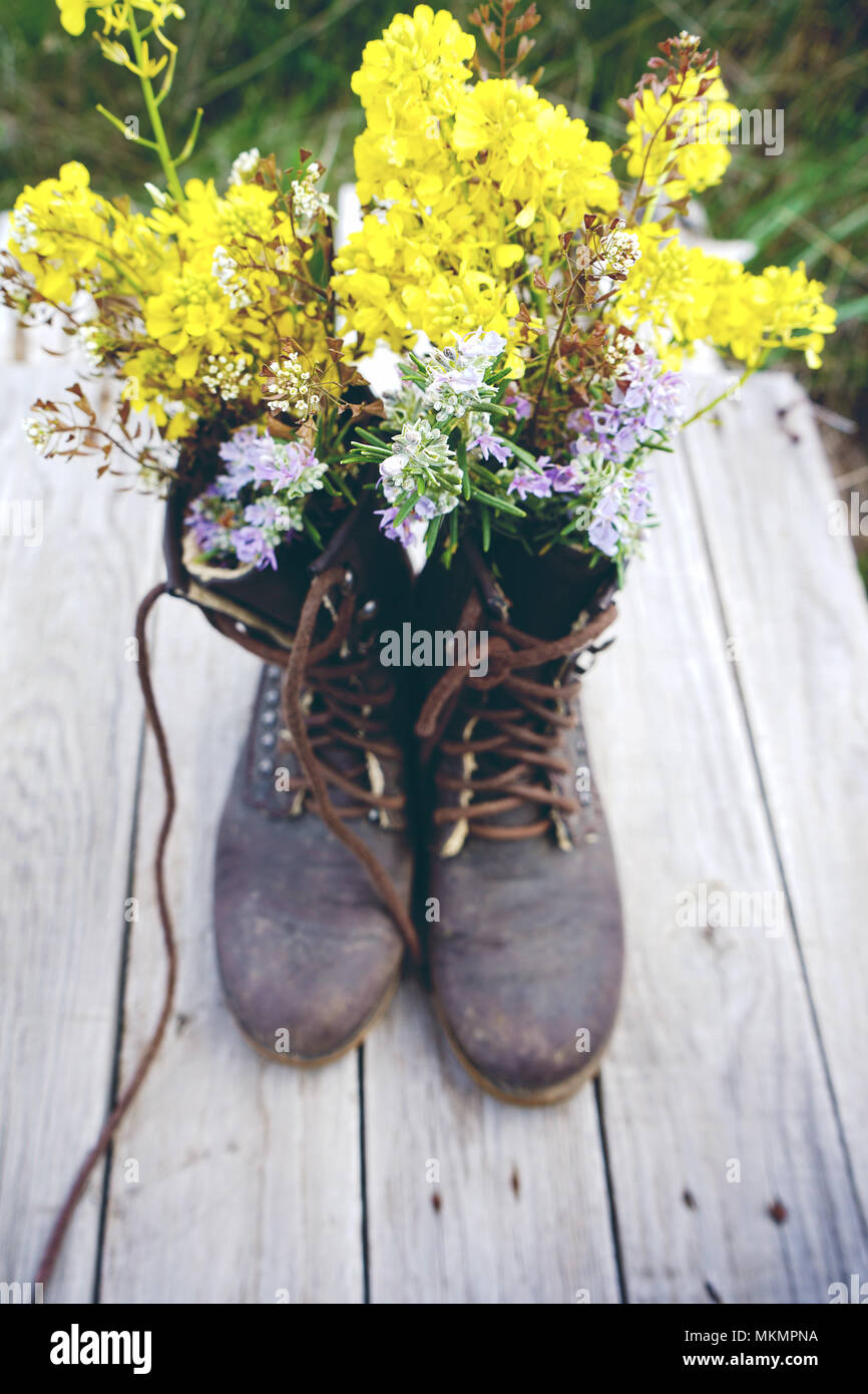 Boots filled with flowers hi-res stock photography and images - Alamy