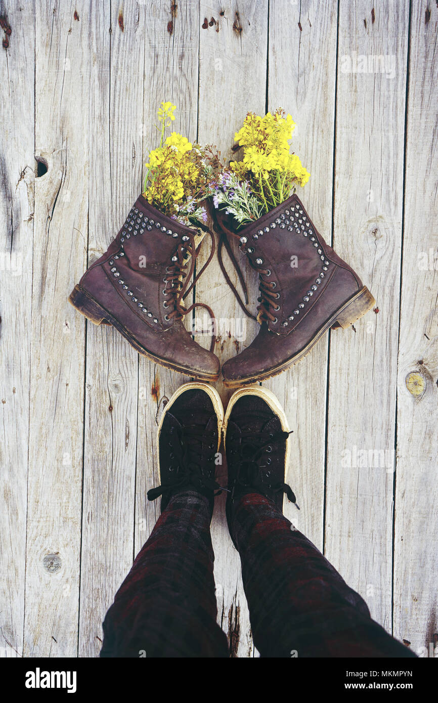 Boots filled with flowers hi-res stock photography and images - Alamy