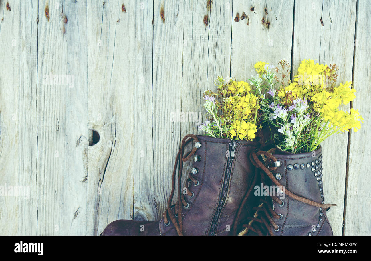 Boots filled with flowers hi-res stock photography and images - Alamy