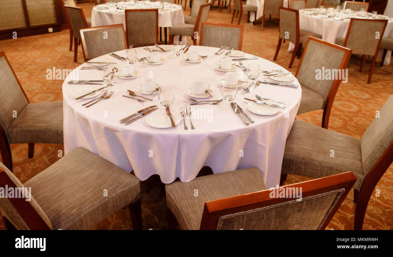 Restaurant table prepared to serve food Stock Photo - Alamy