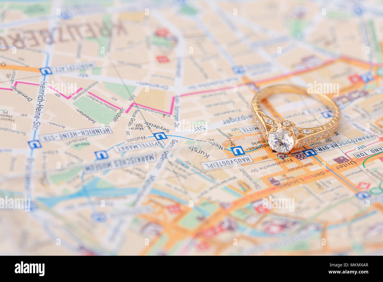 Luxury golden ring on the paper map background Stock Photo - Alamy