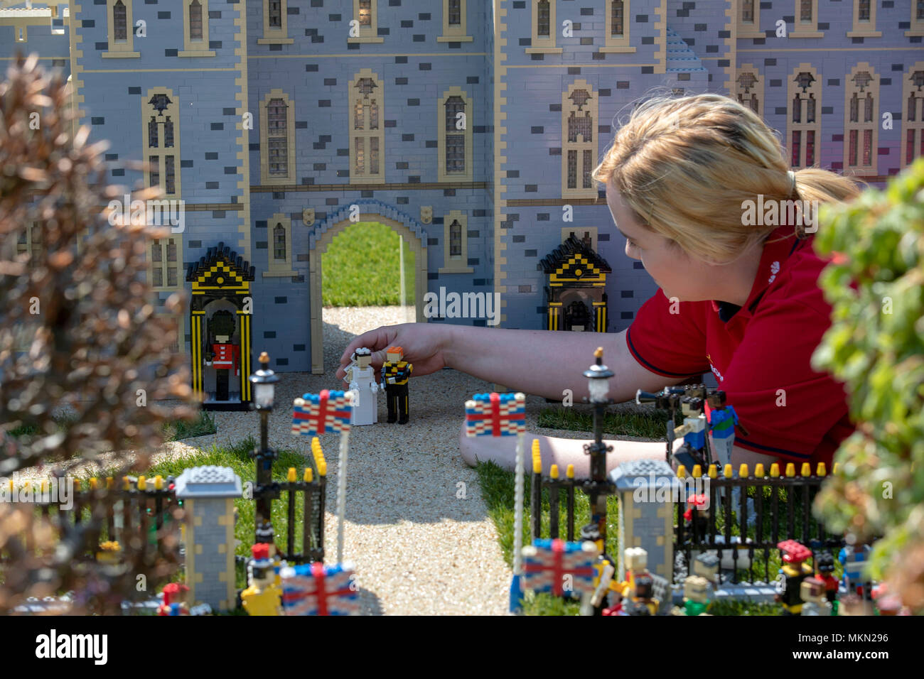 Model maker Lucy Gullon puts the finishing touches to a scene created ...