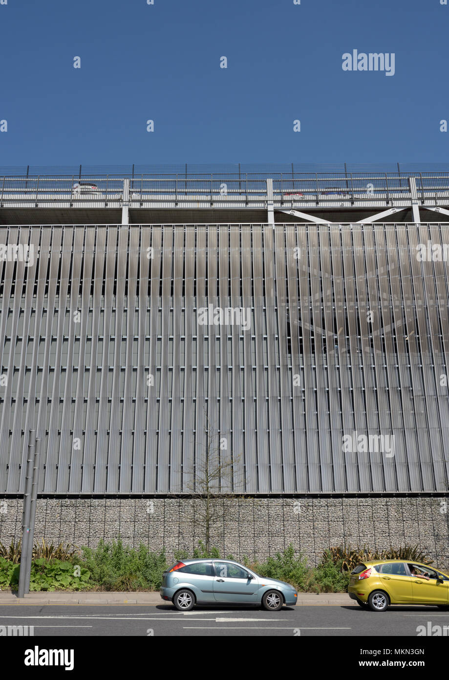 Multi storey car park facade with metal cladding, low angle view in ...