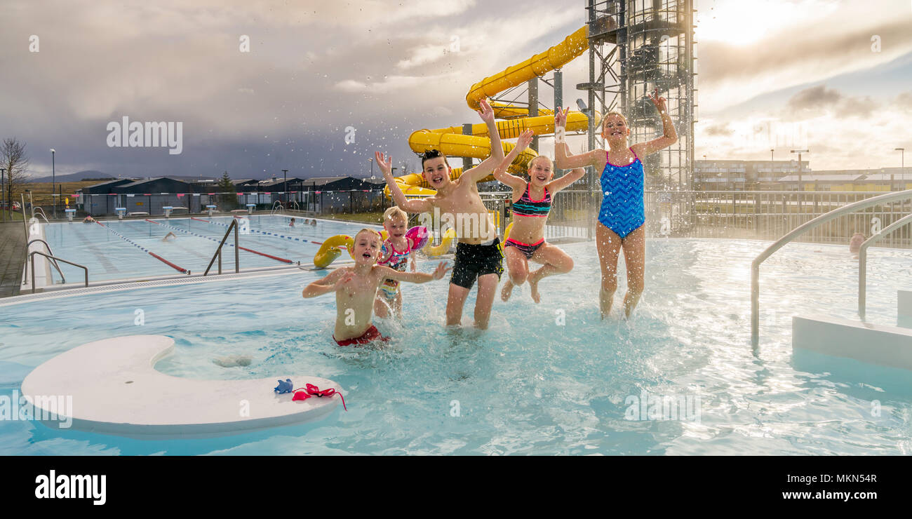 Boys water slide hi-res stock photography and images - Alamy