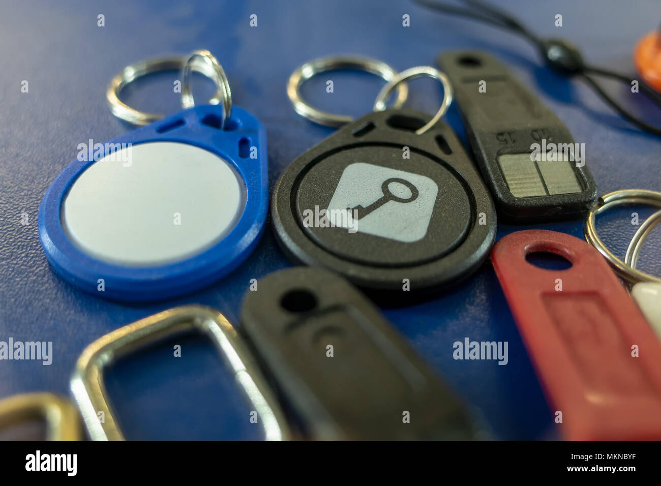 blue and black chip keys from intercom or doorphone Stock Photo - Alamy