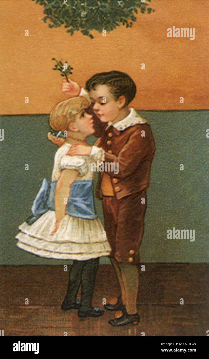 Kissing under mistletoe children hi-res stock photography and images ...