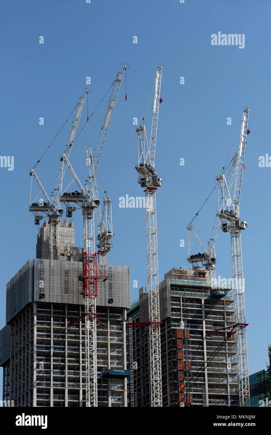 South Bank, London UK. Luffing Jib tower cranes working on the site of ...