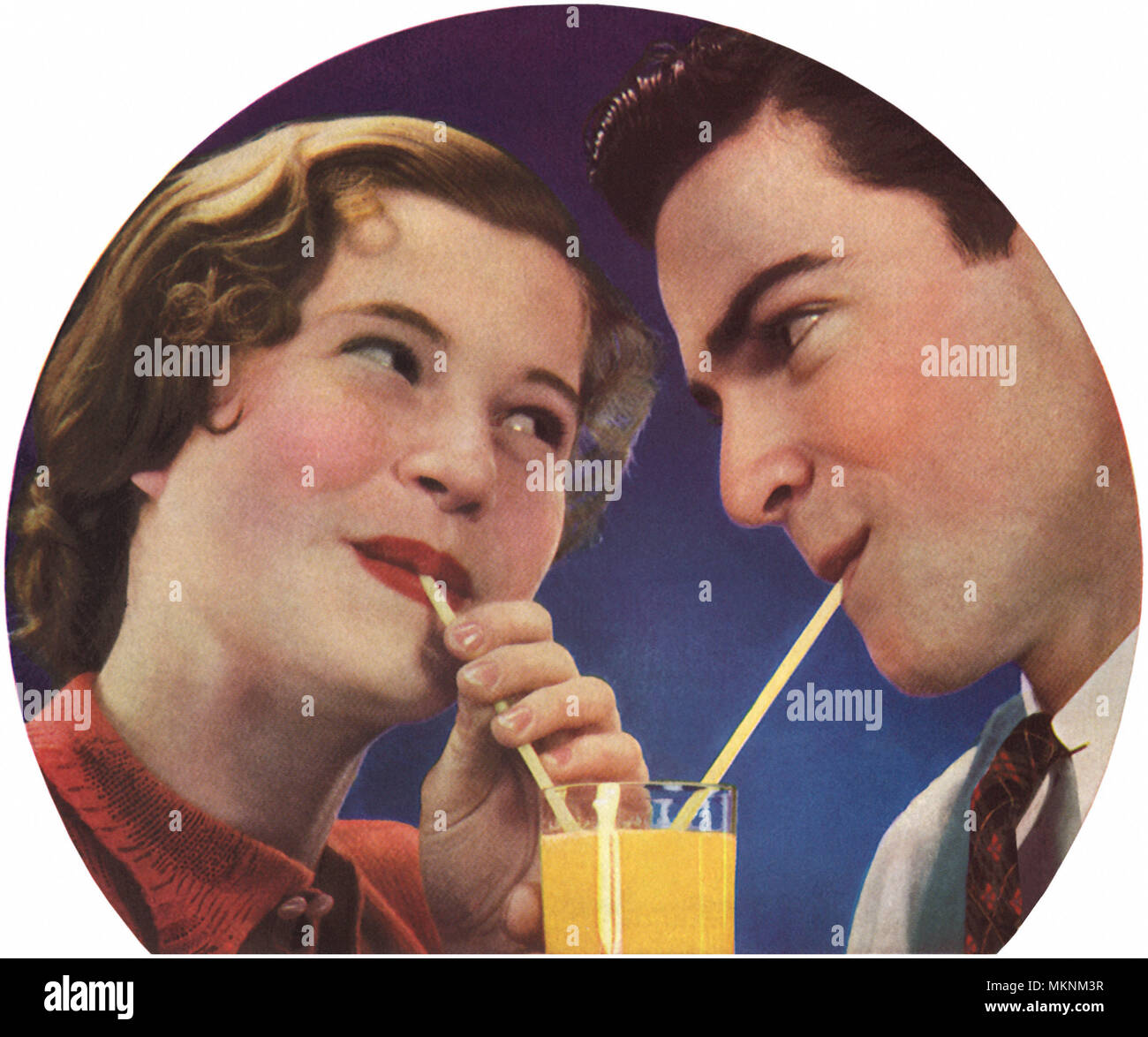 Couple Sipping OJ Stock Photo - Alamy