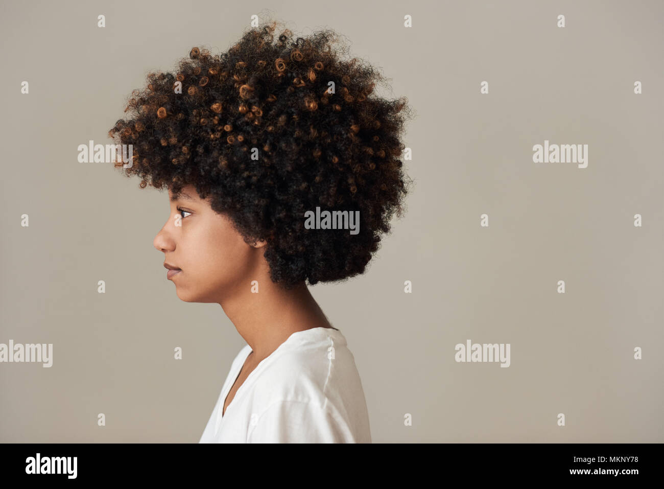 African american woman looking sideways hi-res stock photography and ...