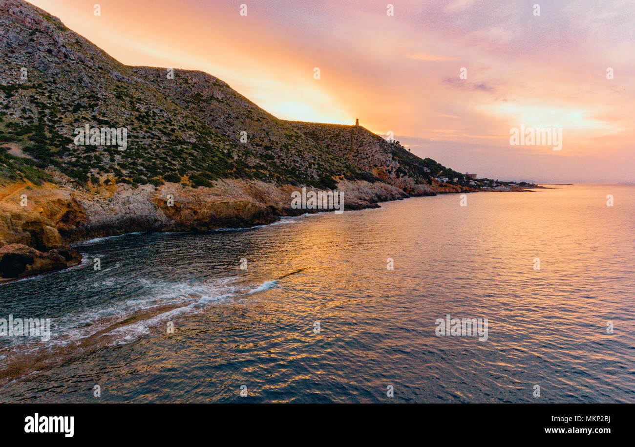 A view from the air to the coast and the sea near the city of Denia ...