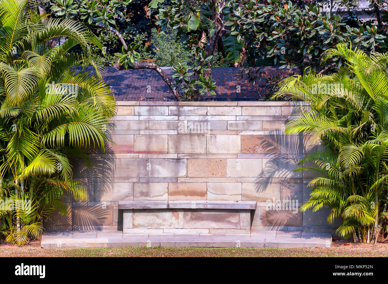 A granite wall inside the WWII cemetery at Silpukhuri, Navagraha Road ...