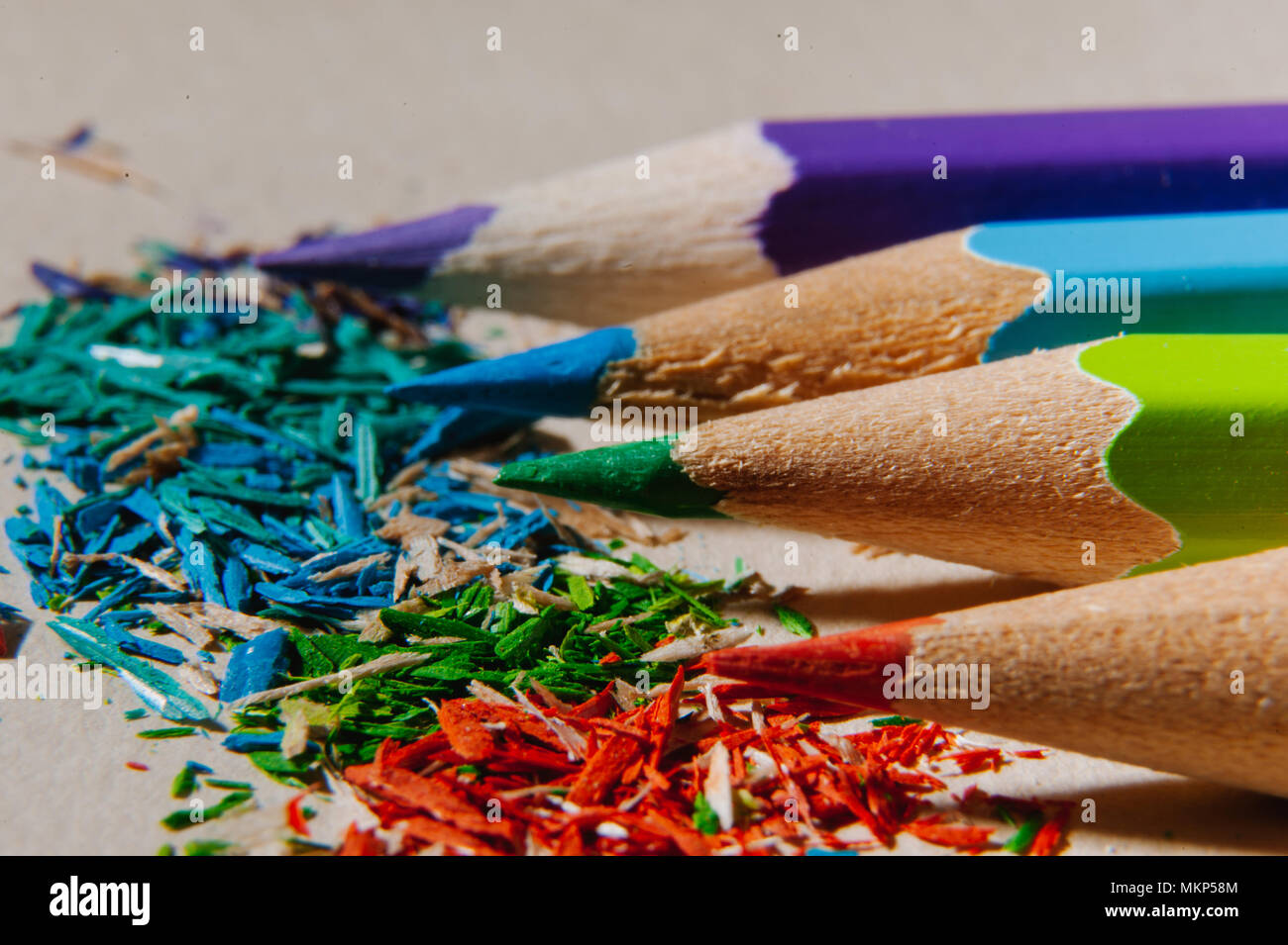 Sharpened colored pencils and shavings Stock Photo - Alamy