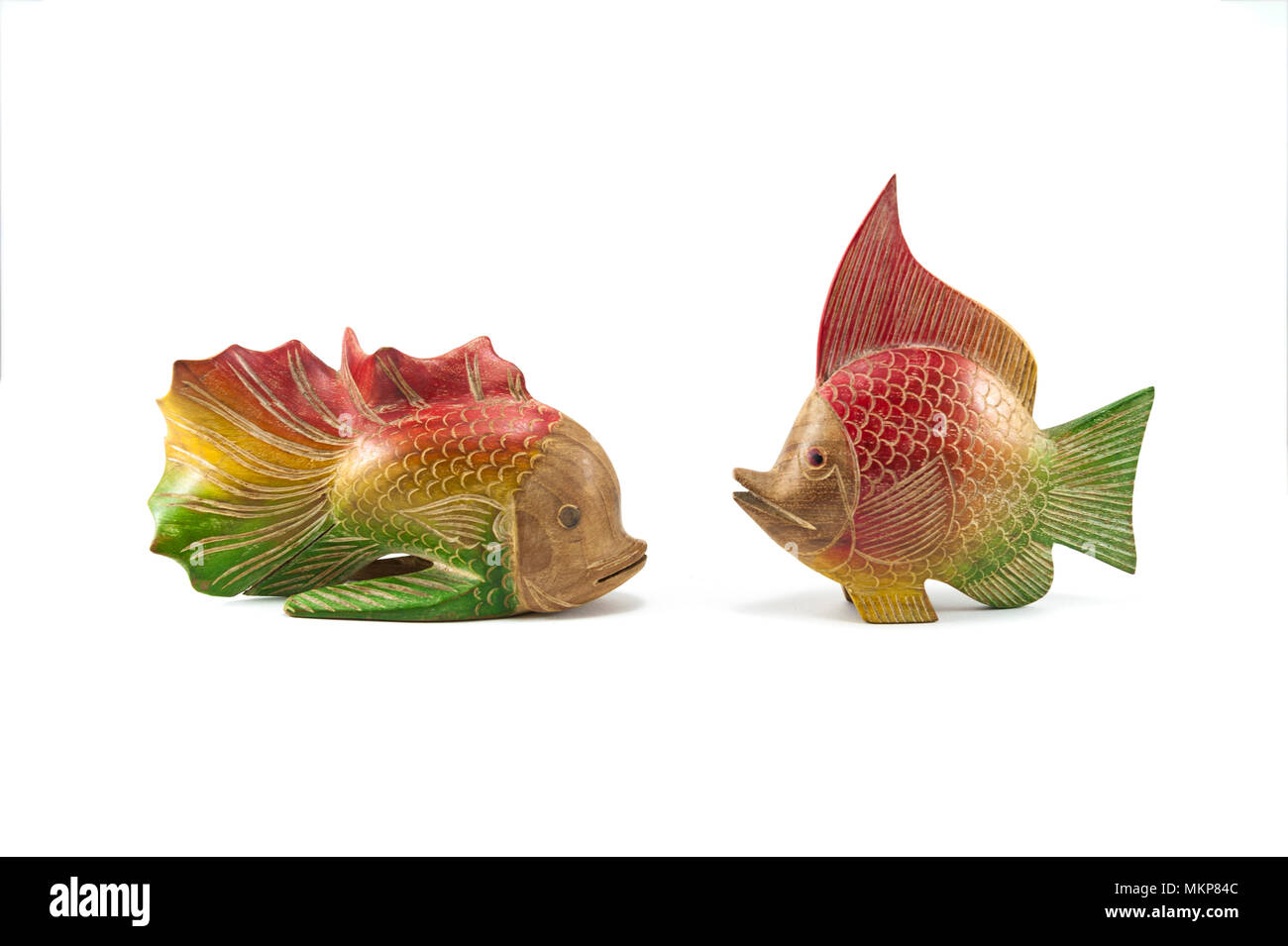 Handcraft wooden fish isolated on white background Stock Photo - Alamy