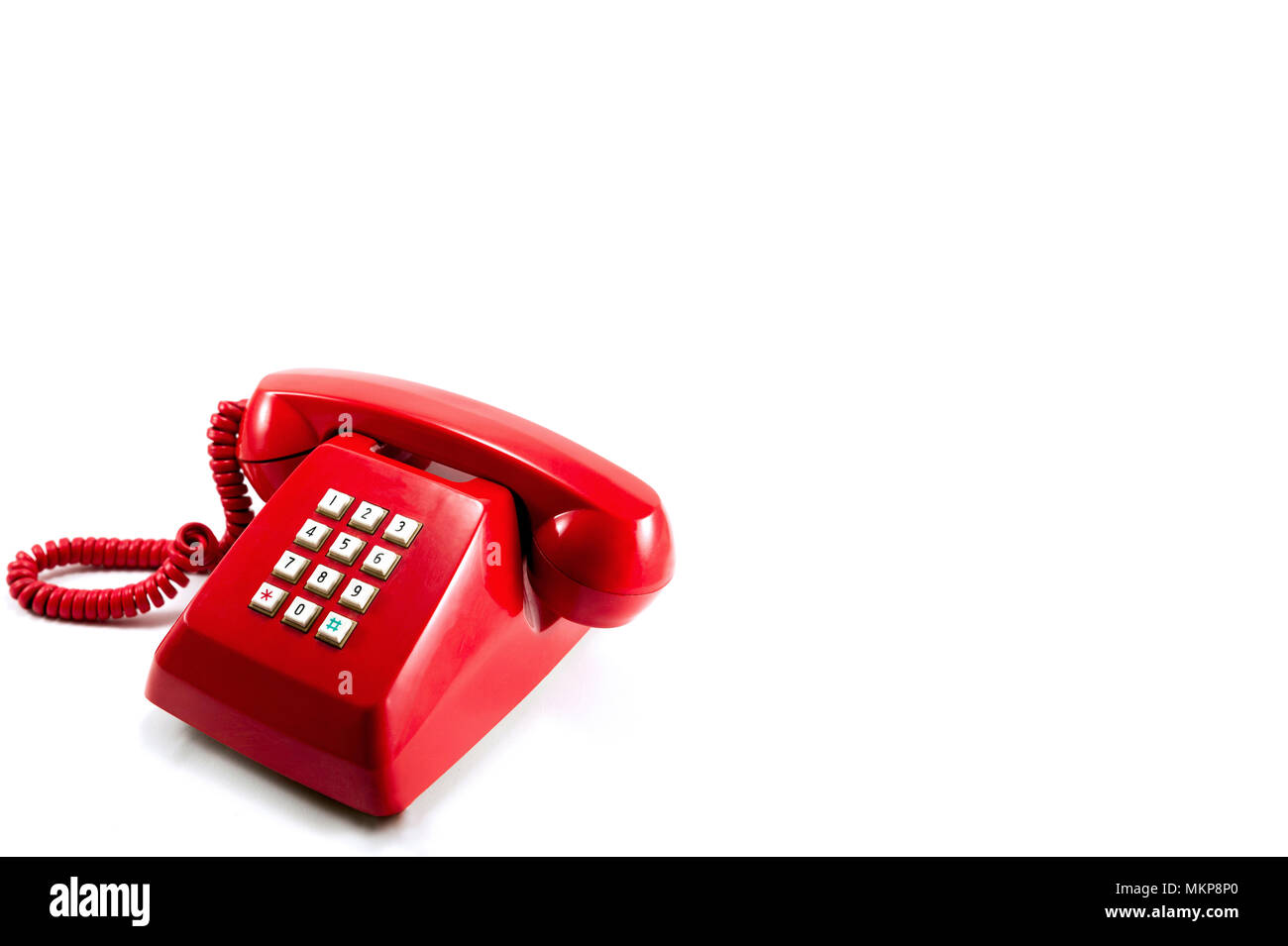 Red vintage telephone isolated on white background Stock Photo - Alamy
