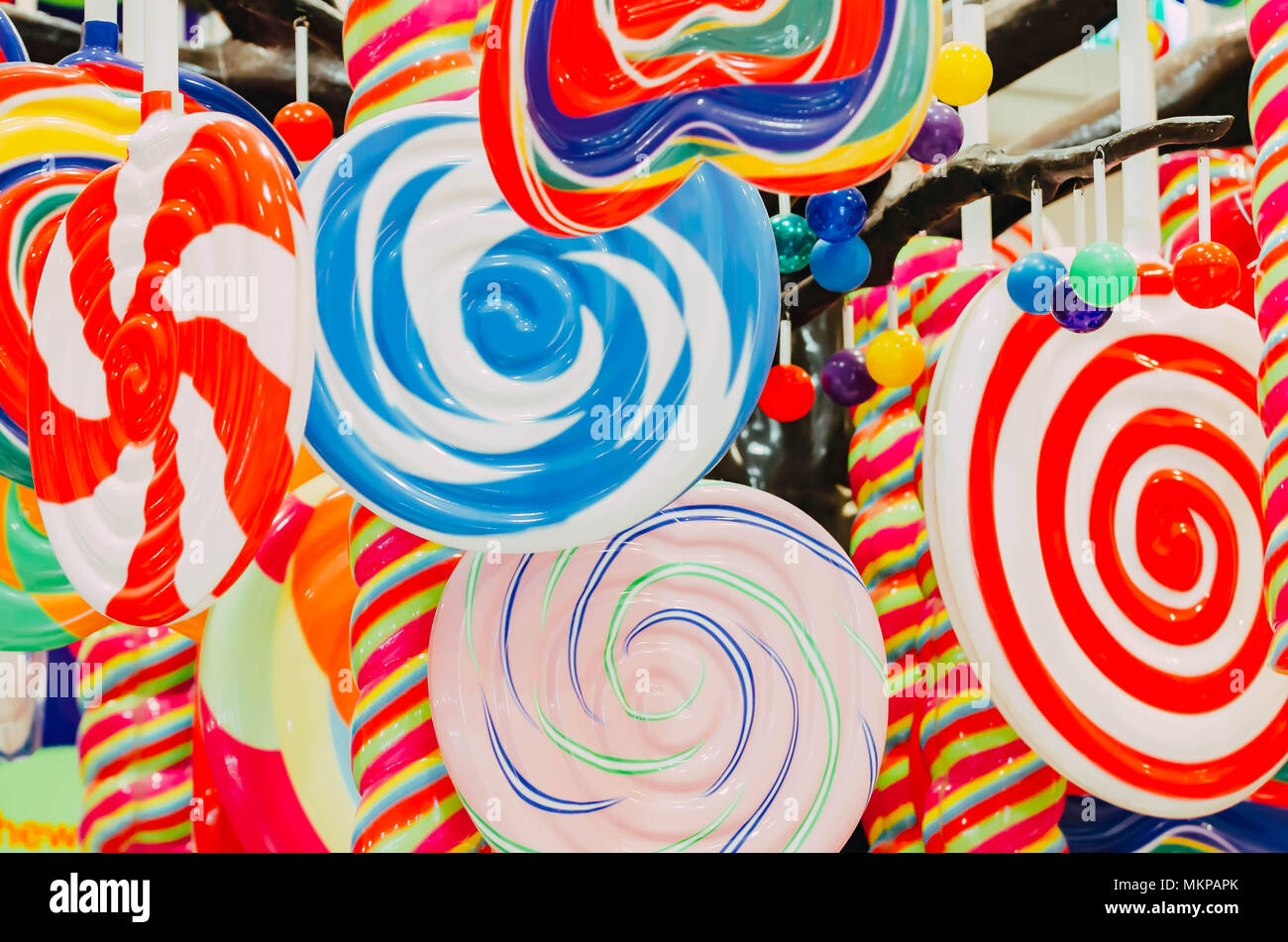Round lollipops in candy shop. Sweets background Stock Photo - Alamy