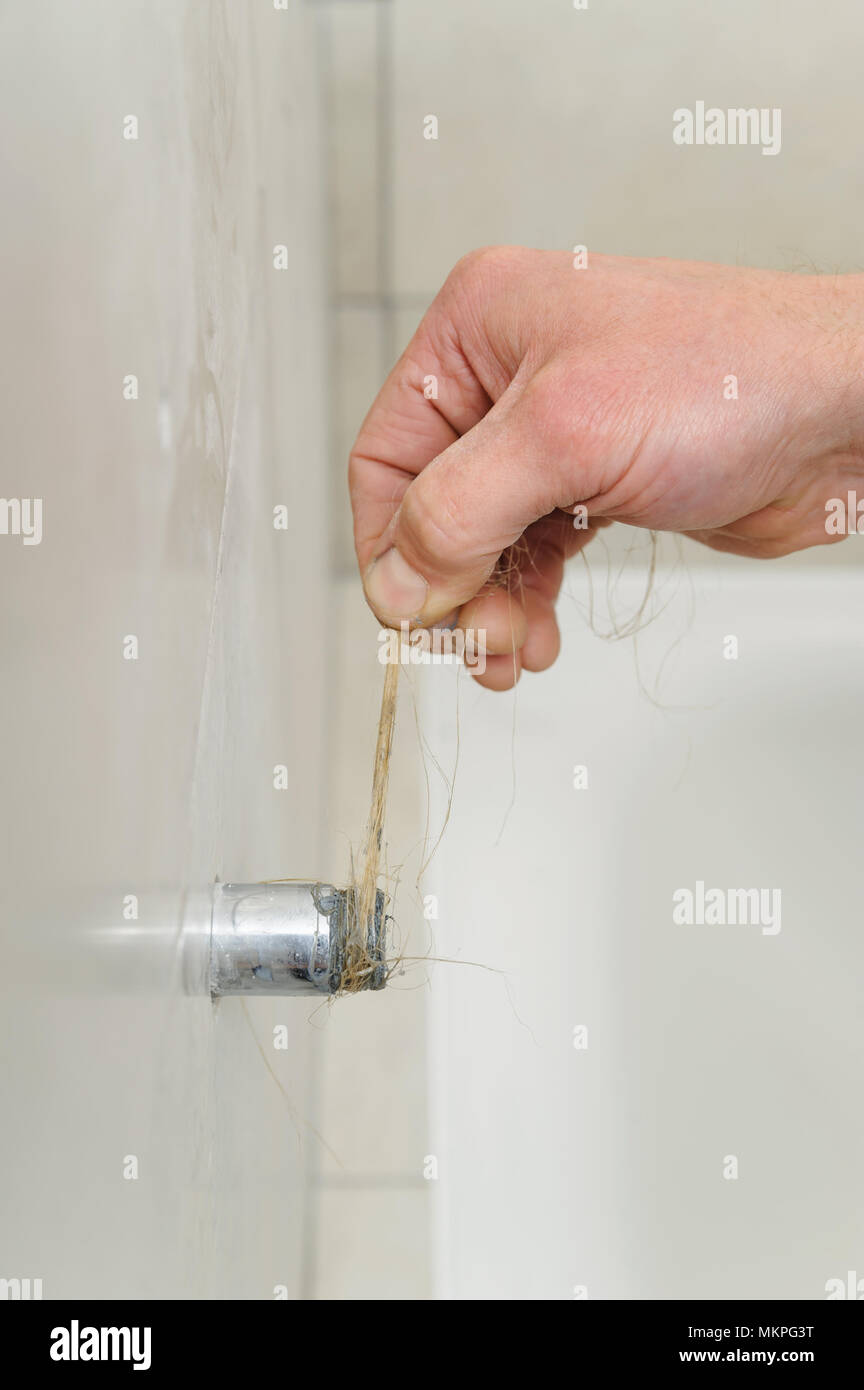 Plumber putting hemp fibers on a thread pipe Stock Photo - Alamy