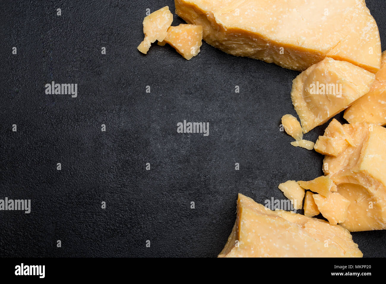 pieces of parmesan or parmigiano cheese Stock Photo - Alamy