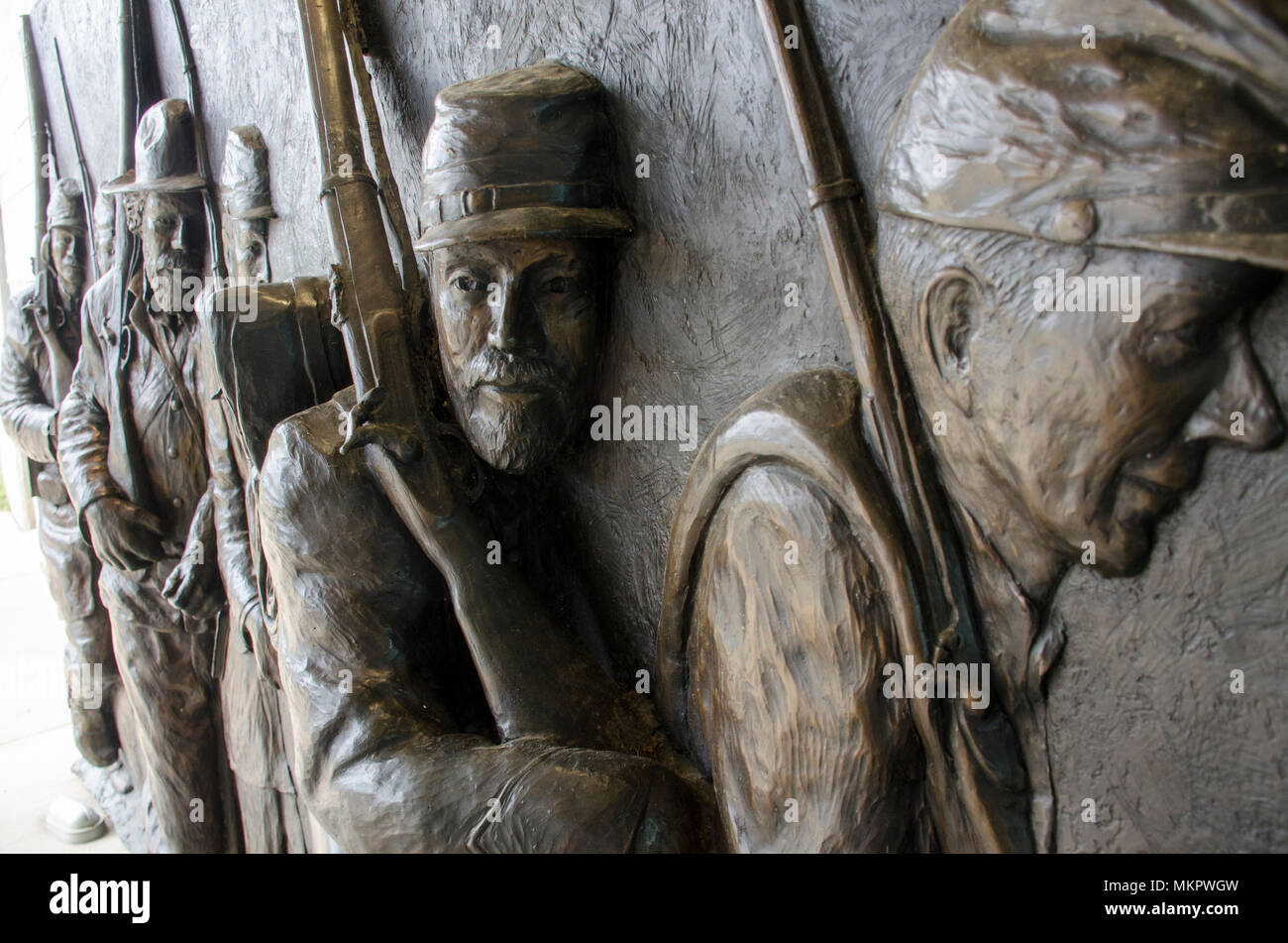 Life-size bronze relief of soldiers lead in to the Corinth Civil War ...