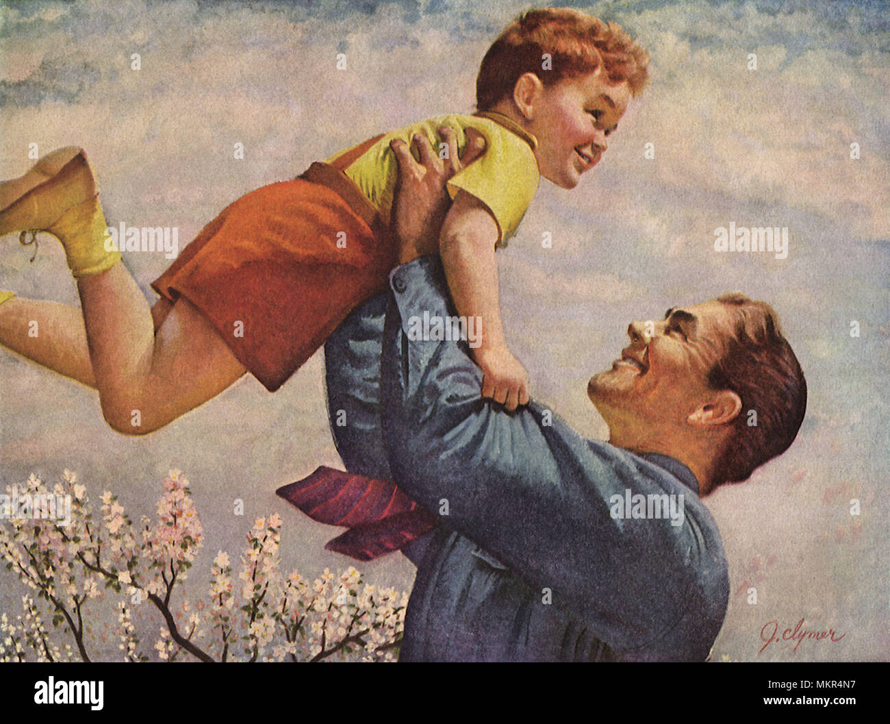 Smiling Father lifting Boy Stock Photo - Alamy