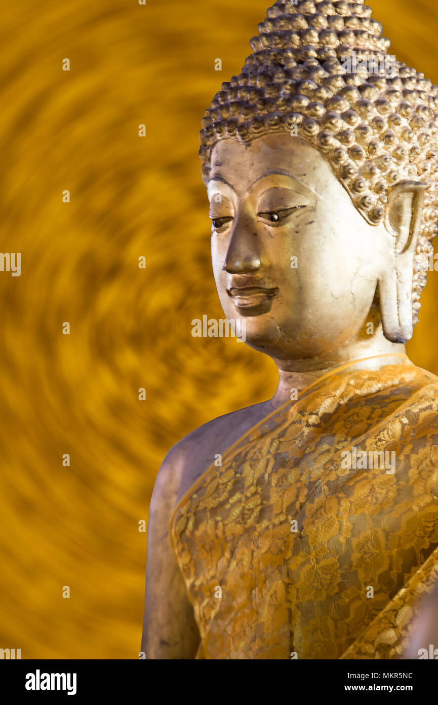 Buddha statue on yellow background used as amulets in Buddhism religion ...