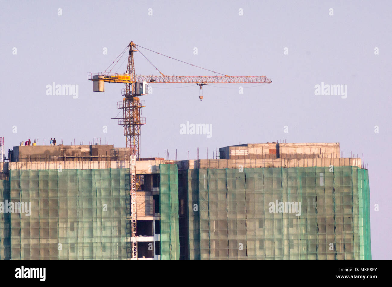 Under construction building with the concrete structure exposed and ...