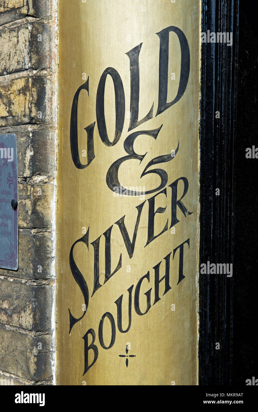Shop sign: gold & silver bought, England UK Stock Photo - Alamy