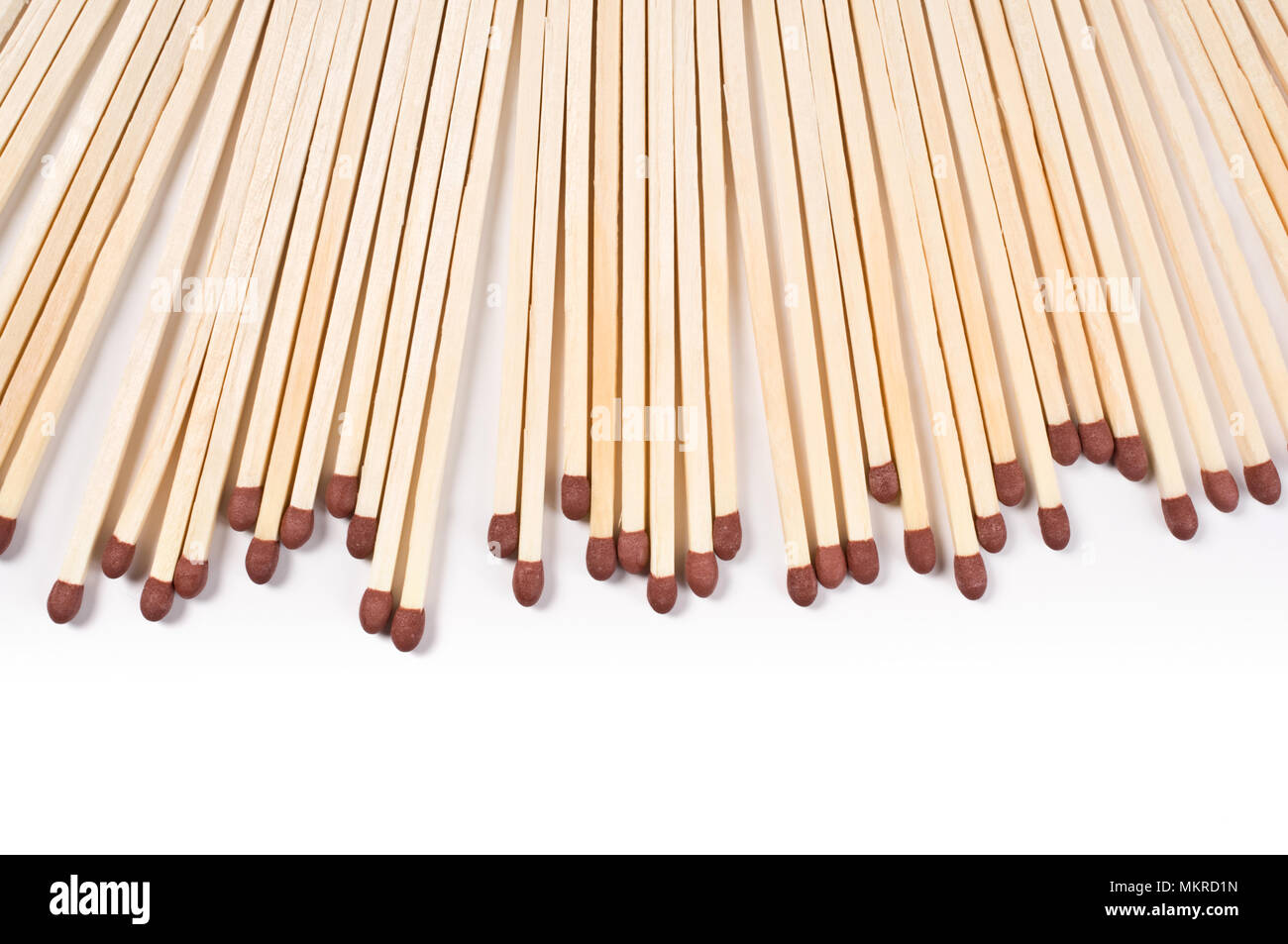 Matches in a row on white background Stock Photo - Alamy
