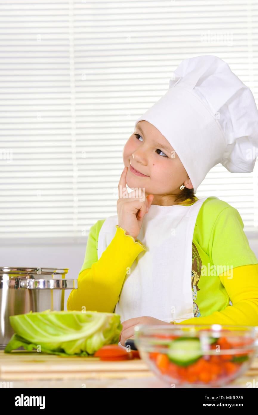 Joyful child wearing chef hi-res stock photography and images - Alamy
