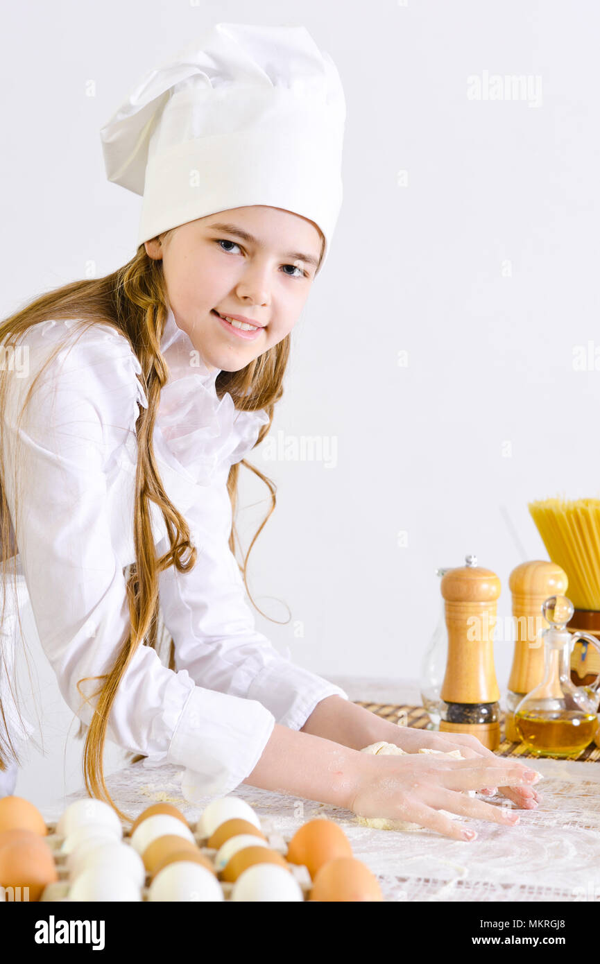 Cute girl baking in the kitchen at home Stock Photo - Alamy