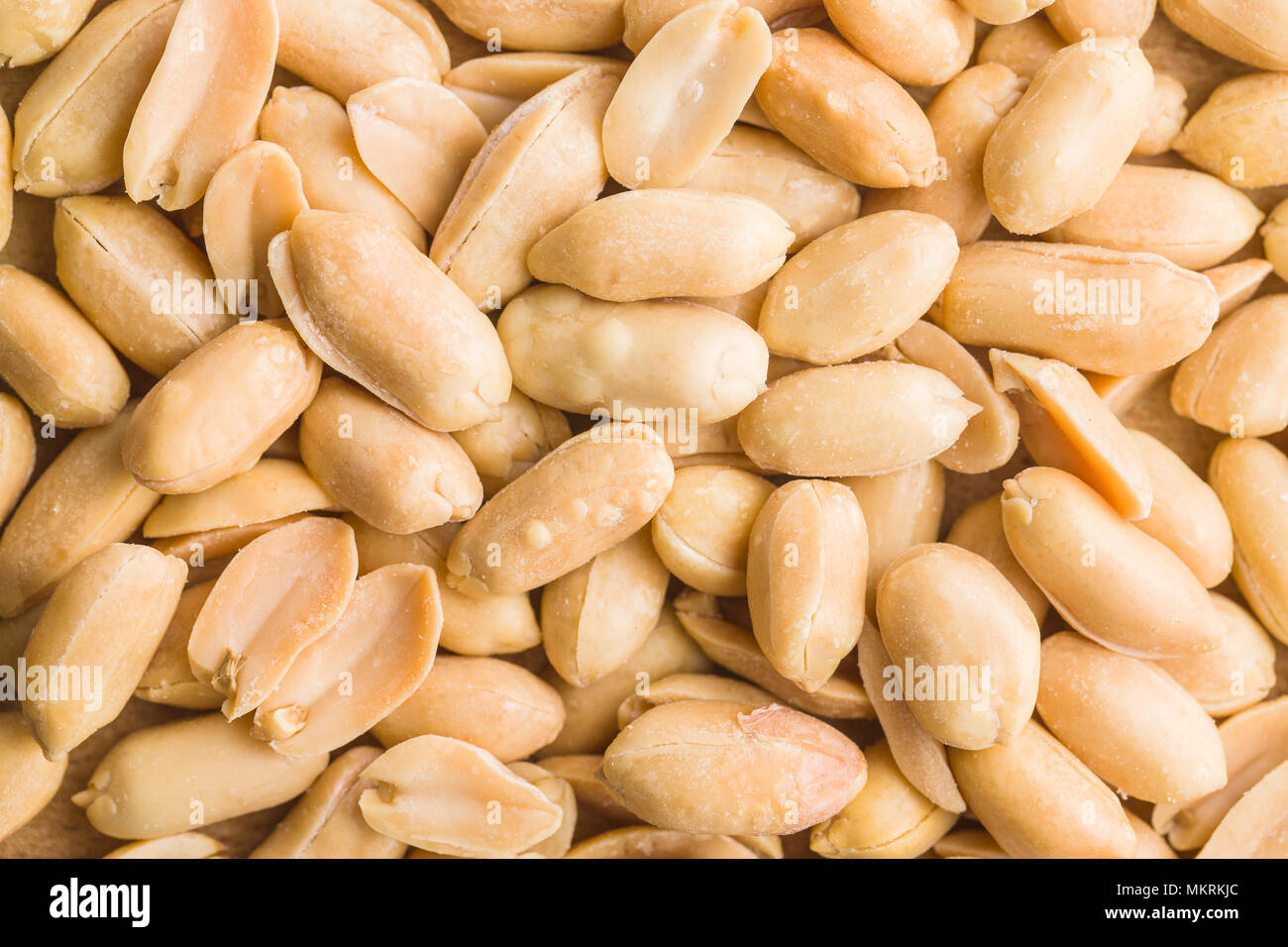 Salty roasted peanuts. Top view Stock Photo - Alamy