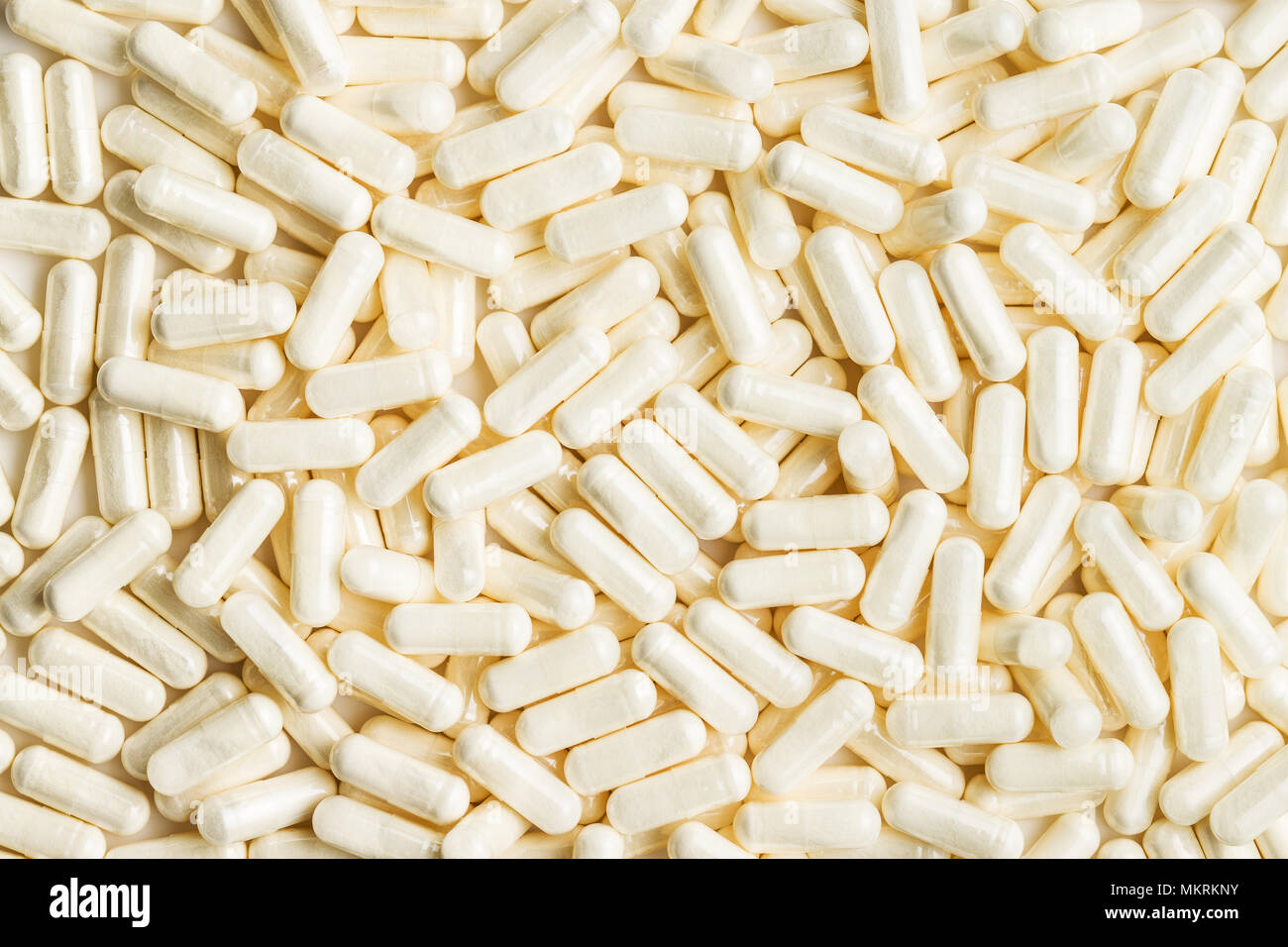 White medicine capsules. Top view Stock Photo - Alamy