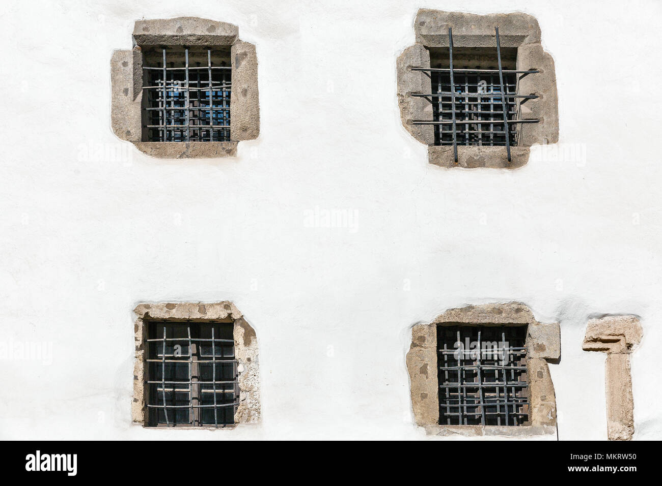 Medieval windows with metal gratings of Miklus prison museum in Kosice ...