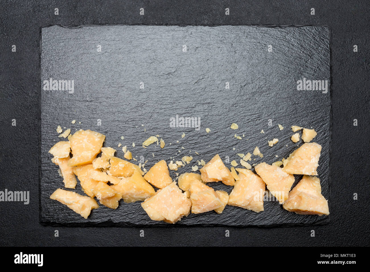 pieces of parmesan or parmigiano cheese Stock Photo - Alamy