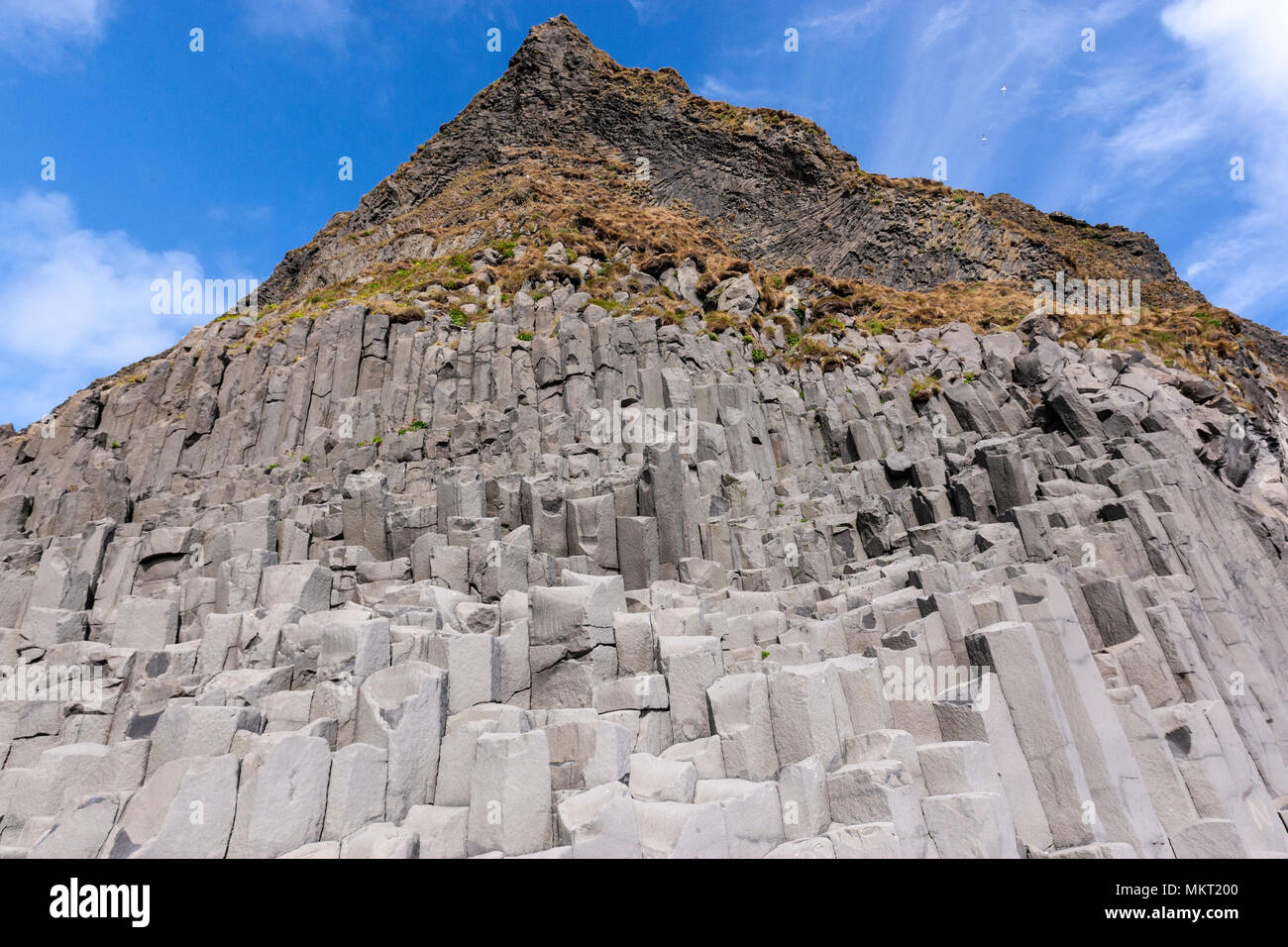 Reynisdrangar are basalt sea stacks situated under the mountain ...