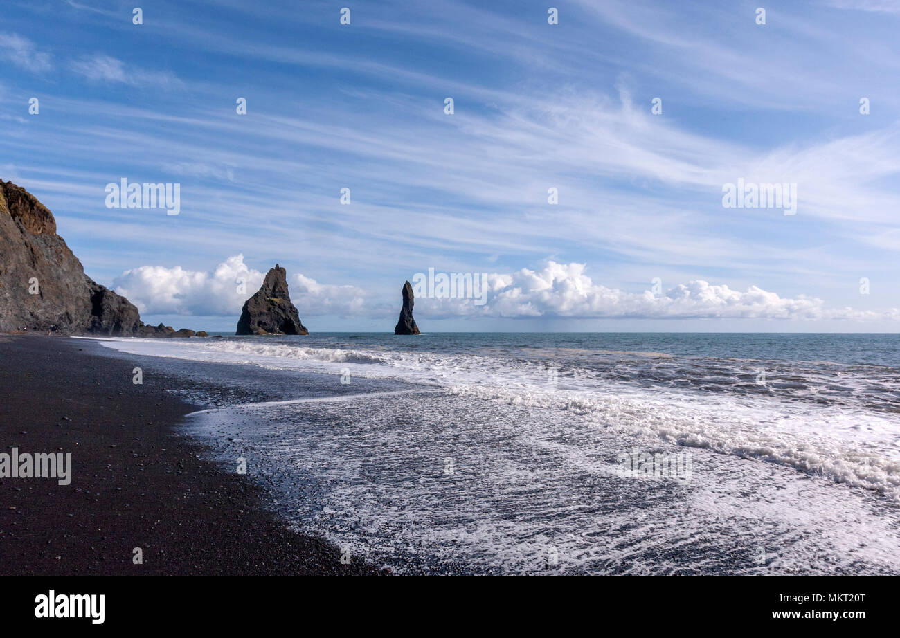 Reynisdrangar are basalt sea stacks situated under the mountain ...