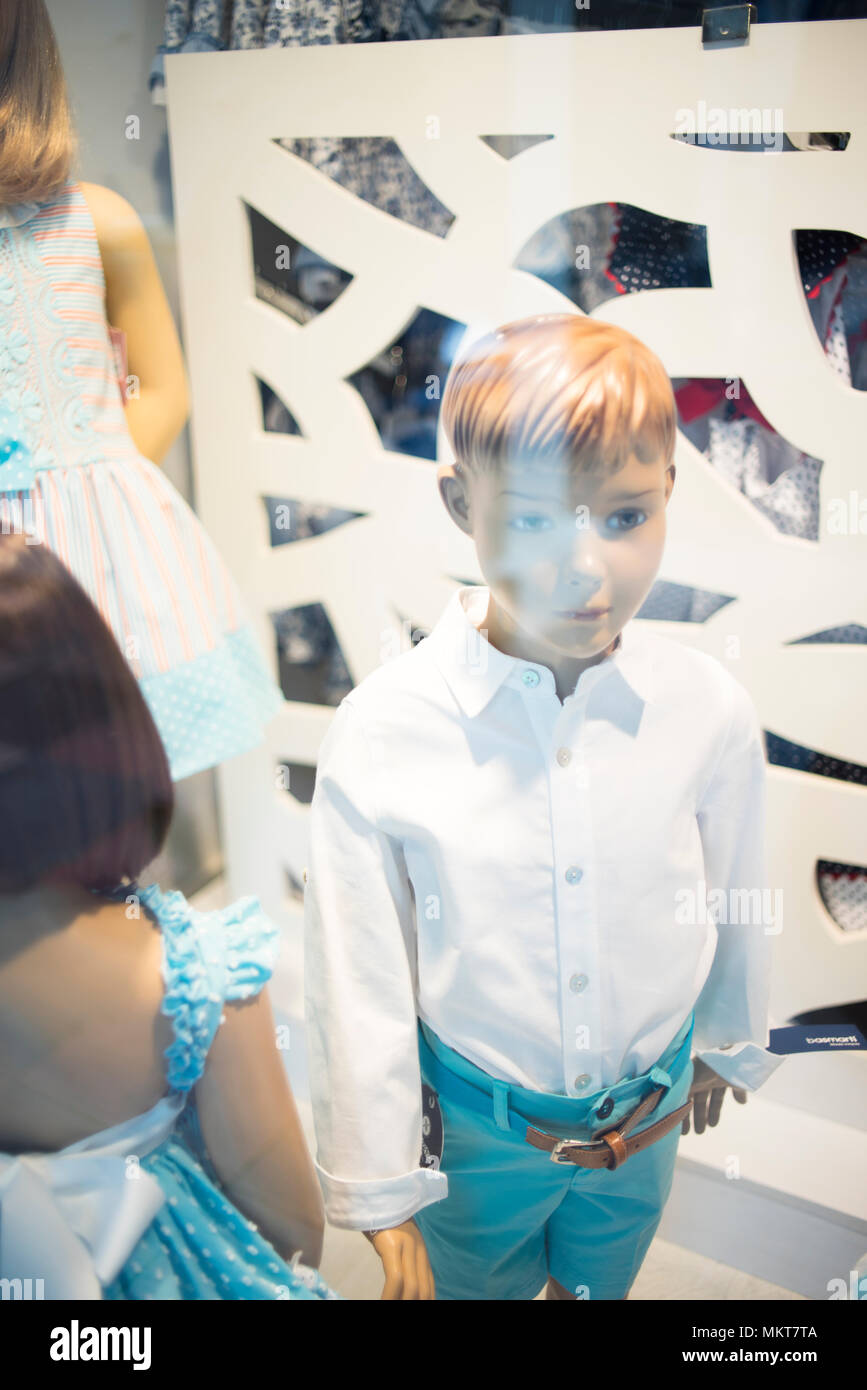 Childrenswear fashion shop window childrens store mannquins kids ...