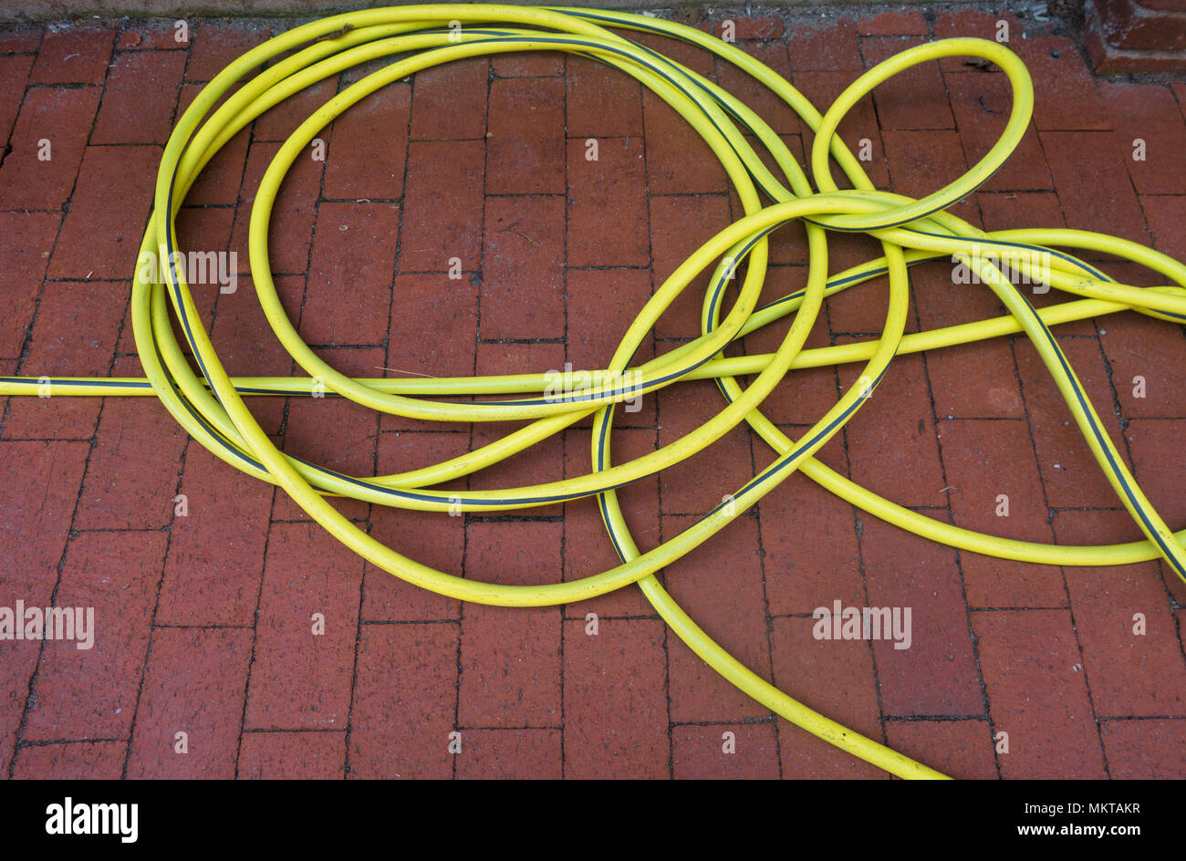 Tangled hose hi-res stock photography and images - Alamy