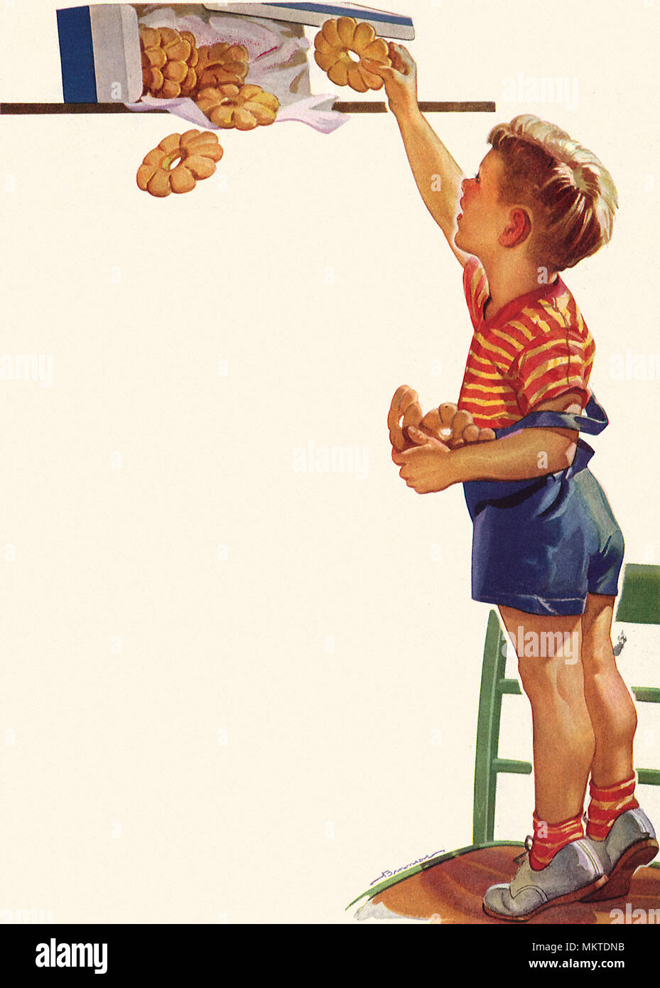 Boy reaching for Cookies Stock Photo - Alamy