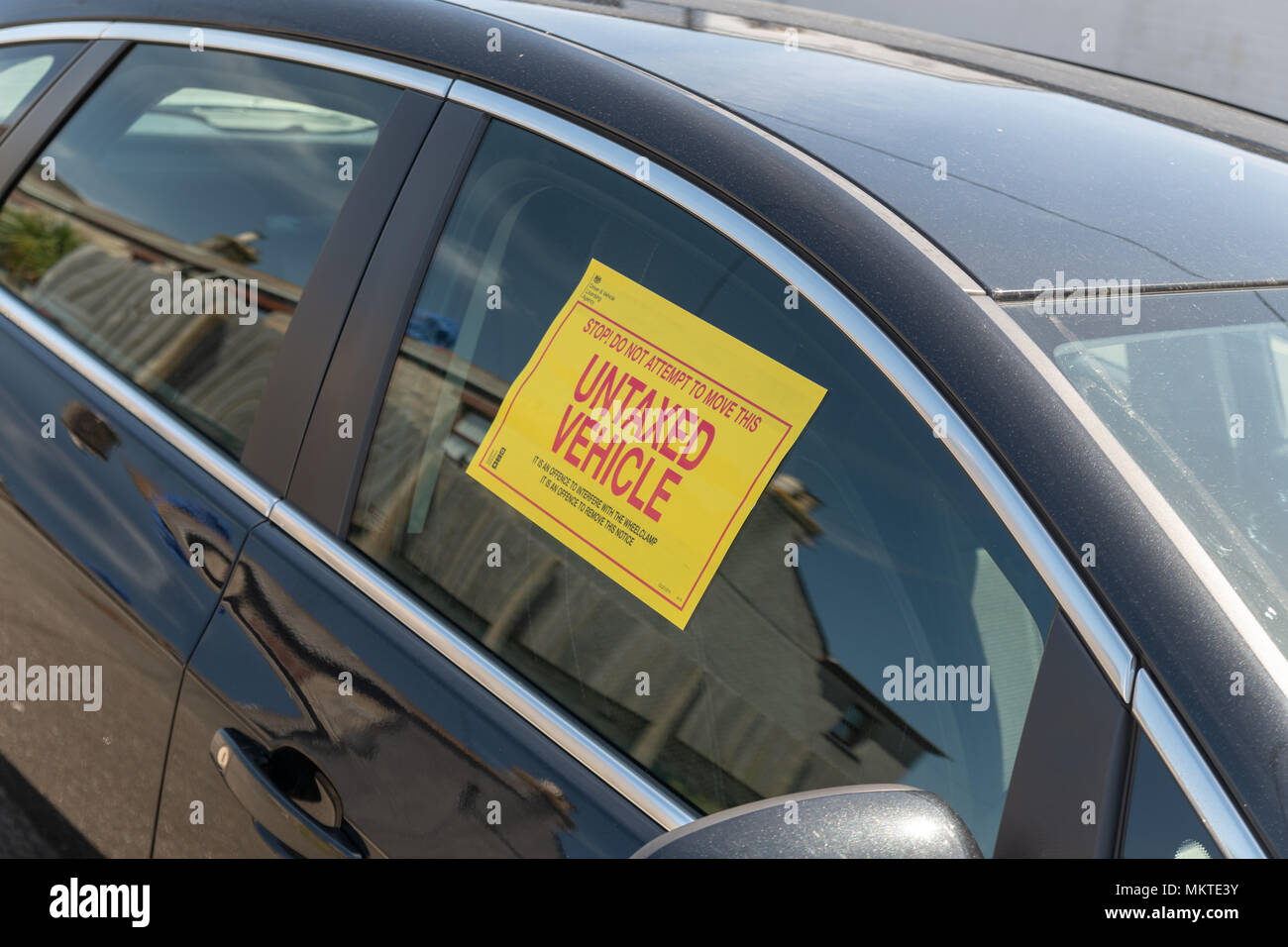 Unpaid vehicle tax notice hi-res stock photography and images - Alamy