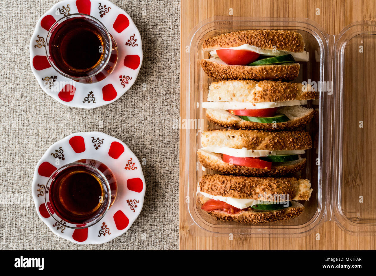 Turkish Bagel Simit Sandwich with cheese, tomato, cucumber and tea ...