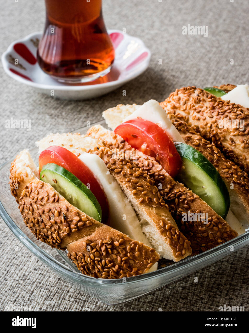 Turkish Bagel Simit Sandwich with cheese, tomato, cucumber and tea ...